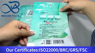 green plastic ziplock bag with clear window for floss pick