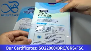 blue plastic zipper bag with clear window for dental flossers