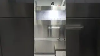 Fully automatic cabinet-type cage washing machine
