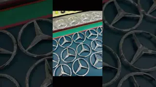 Display of the finished product after the vehicle logo undergoes vacuum coating process