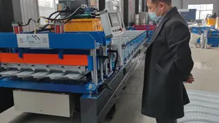 Roof sheet forming machine