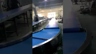 Assembly line packaging conveyor belt