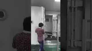 Double-door evaporation coating machine for coating automotive parts