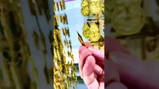 Golden pen tip with vacuum-coated film layer