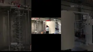 Glass bottle vacuum coating with iridescent effect