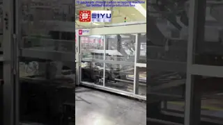 Carton wrapping machine with a capacity of 70 packs per minute