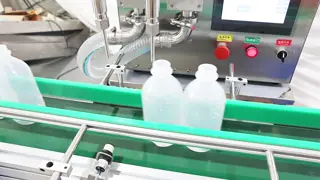 Two heads liquid filling machine
