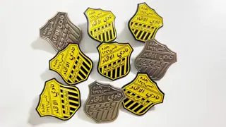 Custom gold metal lapel pins in soft or hard enamel from China wholesale, ideal for hats and clothes
