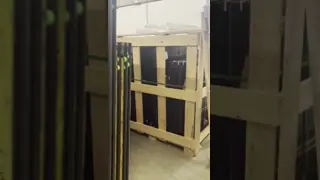 Orders for doors, windows, and glass curtain walls destined for Tanzania are being shipped in wooden
