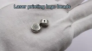 Flat round metal beads with black laser logo -G5850