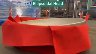 Stainless steel end caps were protected by red cloth throughout the process.