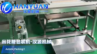 Puffed rice bar packing machine