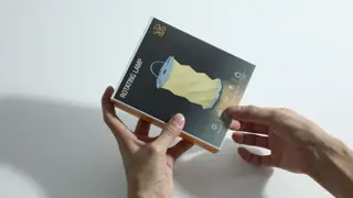 Foldable rotating Paper Lamp