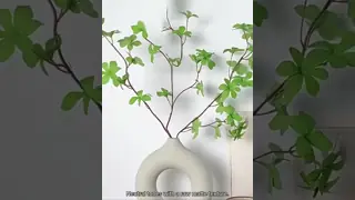 Wabi-sabi style circular irregular ceramic vase