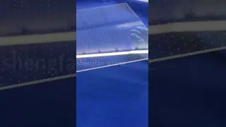 Laser-drilled quartz glass sheet