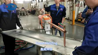 Welding the galvanized door with the suspension spot welder