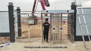 Full-height turnstile installation at construction site | Access via card swiping