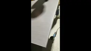 Aluminum door with  a sound-dampening strip