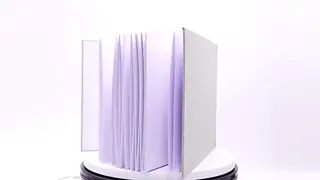 Custom‑made linen‑covered guest book with100 blank inner pages for daily notes and souvenir messages