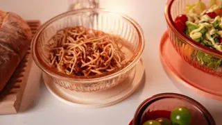 colored glass salad bowl with ribbed design
