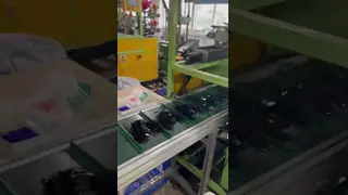 Actual shooting of the automated production process for black label label application, plastic moldi
