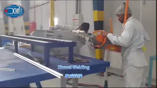 Welding a carbon steel box with the hanging spot welder