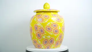 Yellow Ceramic Ashes Urn with Decorative Flower Artwork