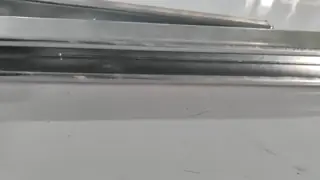 Half welded trailing arm