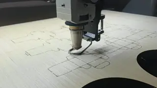 HIGH  PRECISION  DIE-BOARD  LASER  CUTTING  MACHINE