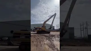 Used CAT 320BL extended-arm excavator