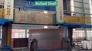 Heavy steel cylinder machining in progress
