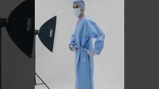 Needle-punched surgical gown