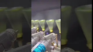Automated Coating System for Cosmetic Glass Containers
