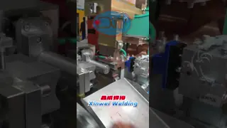 Welding shock absorber with projection welder
