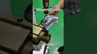 Automotive Nuts Are Precisely Spot Welded with a Vertical Medium-Frequency Spot Welder