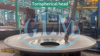 spinning operation for big open‑center dished heads.