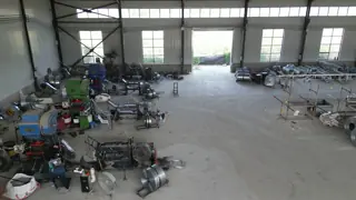 The drone's perspective takes you on a tour of the Razor Wire factory.