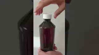 Plastic bottle with Child Closures With Crack Sound Red Writing Caps