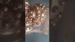 Tricone drill bit