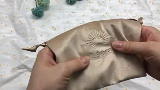 champagne velvet drawstring pouch with emboss logo