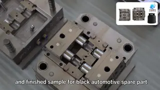 This display features an injection mold and finished sample for black automotive spare part.