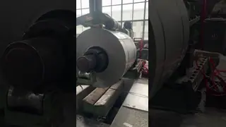 Uncoiling stainless‑steel coils in progress