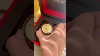 Gold chronograph watch