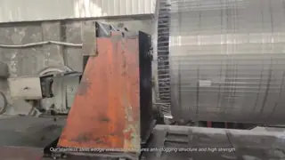 Machines and workers in the workshop are producing and processing wedge-wire screens.