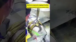 Processing of 75kg heavy-duty aluminum components for new energy vehicles.