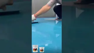 Install epoxy colored sand floor paint. Seamless, dust free, tire marks wipe right off.