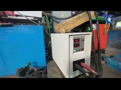 Schmiedefeuer durch Induction in der Hochtemperatur mit Roboterarm è un apparecchio di combustione ad alta temperatura utilizzato per la combustione dei metalli.