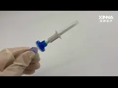 needleless iv bag spike with filter and lipid/alcohol resistant valve port
