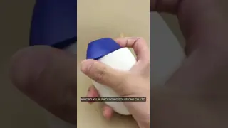 white smooth plastic bottle with blue lid for shampoo