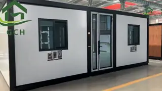 modernist obsidian gray living module with broken bridge aluminum glass door and luxury backyard